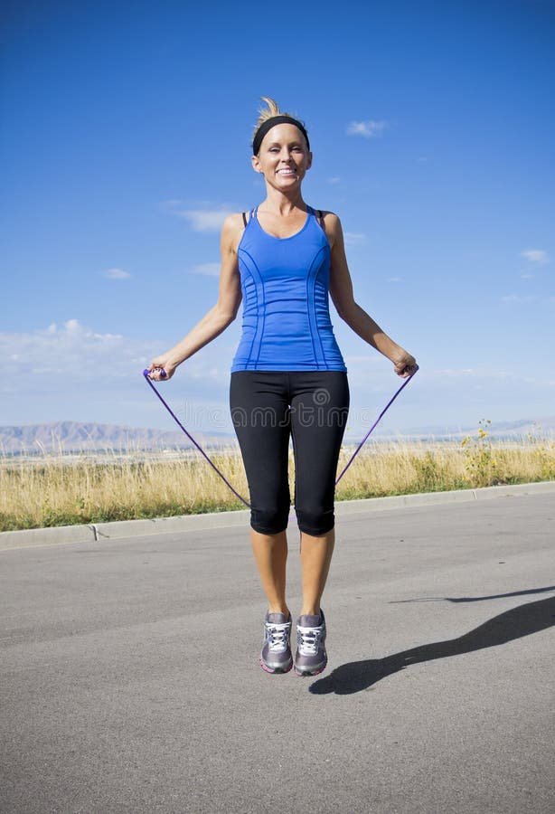 Women Exercising and Jumping Rope Stock Image - Image of jumprope, face ...