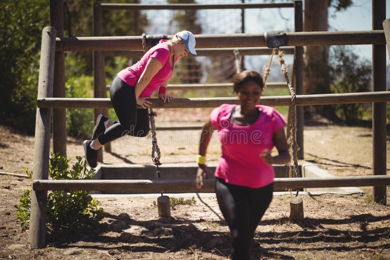 Women Exercising during Obstacle Course Stock Image - Image of climbing ...
