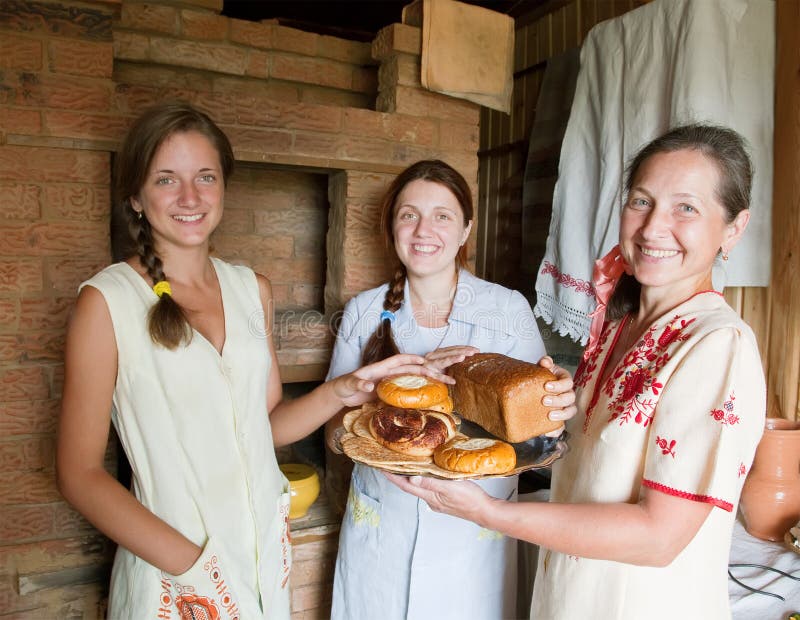 Women with farm-style meal stock image. Image of kitchen - 15333779