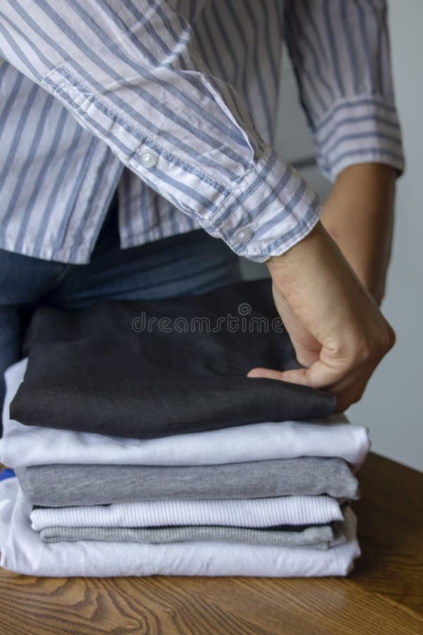 Women Folding Fresh Washed Clothes Stock Image - Image of closeup, home ...