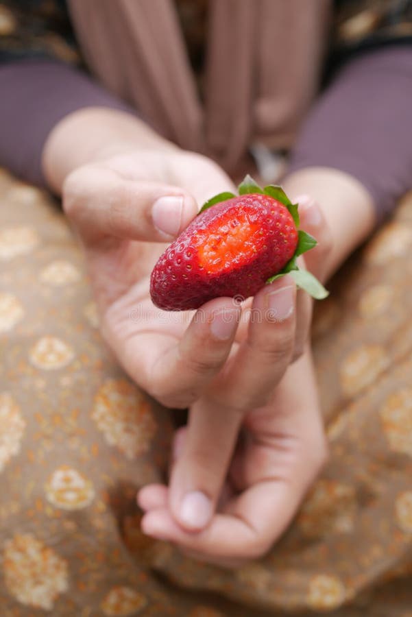 Women Hand Eating Ripe Red Strawberries, Stock Photo - Image of ripe ...