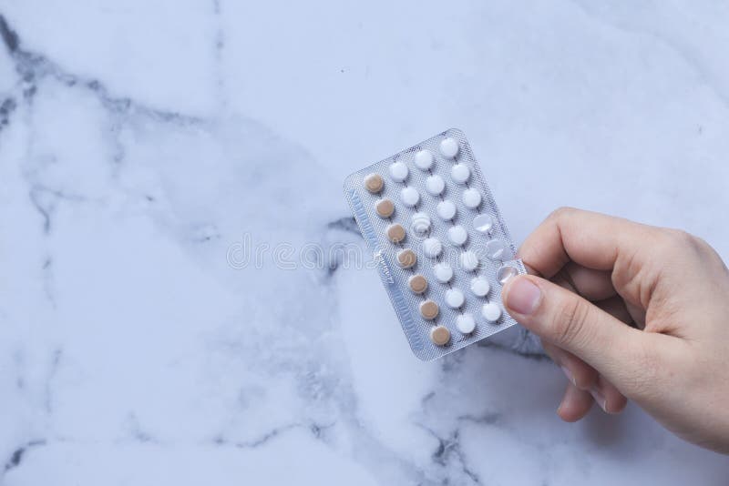 Women Hand Holding Birth Control Pills Top View Stock Photo - Image of ...