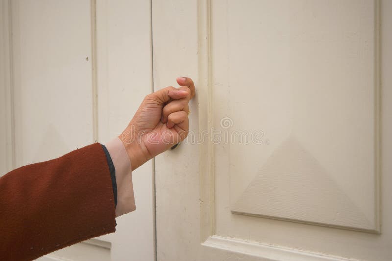 Women hand knock the door stock photo. Image of opportunity - 308753962