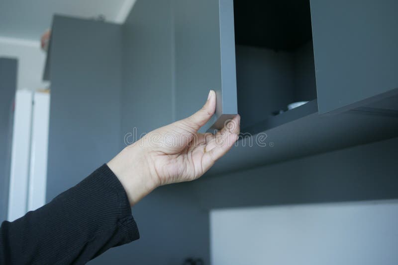 Women Hand Open a Kitchen Cabinet Drawer Stock Image - Image of desk ...