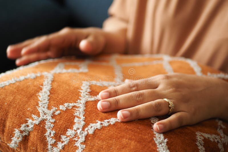 Women Hand on a Orange Color Pillow Stock Image - Image of comfortable ...