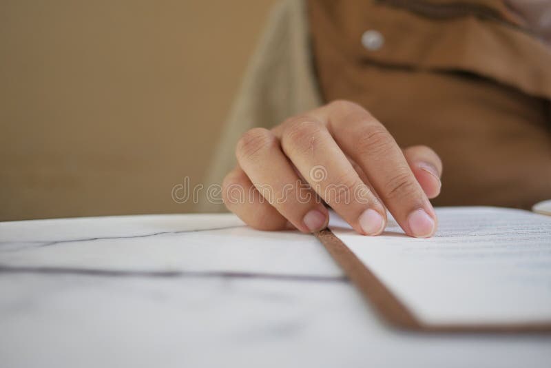 Women Hand Reading a Food Menu at Cafe. Stock Photo - Image of ordering ...