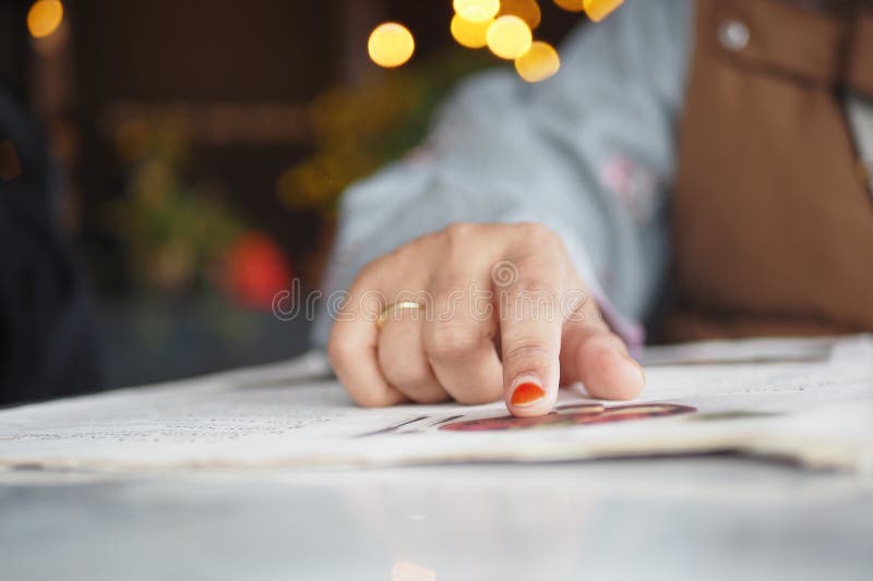 Women Hand Reading a Food Menu at Cafe. Stock Image - Image of ordering ...