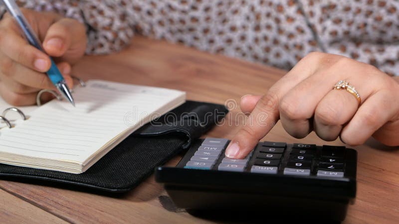 Women Hand Using Calculator on Office Desk Stock Video - Video of ...