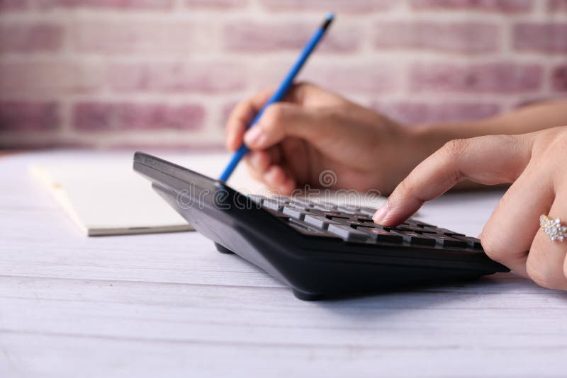 Women Hand Using Calculator on Office Desk Stock Image - Image of diary ...