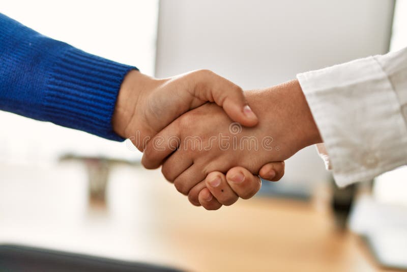 Women Hands Signing Contract with Handshake at the Office Stock Photo ...