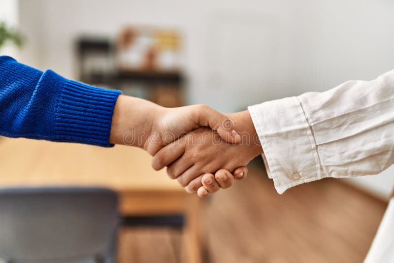 Women Hands Signing Contract with Handshake at the Office Stock Photo ...