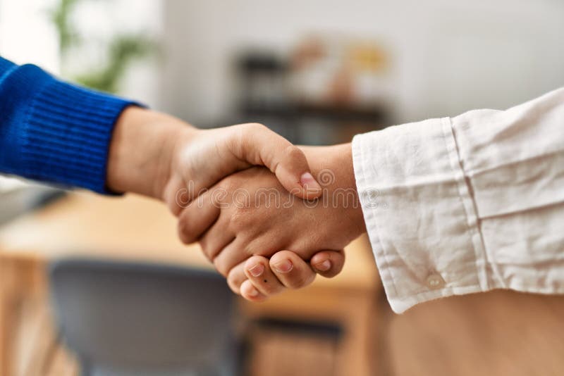 Women Hands Signing Contract with Handshake at the Office Stock Photo ...