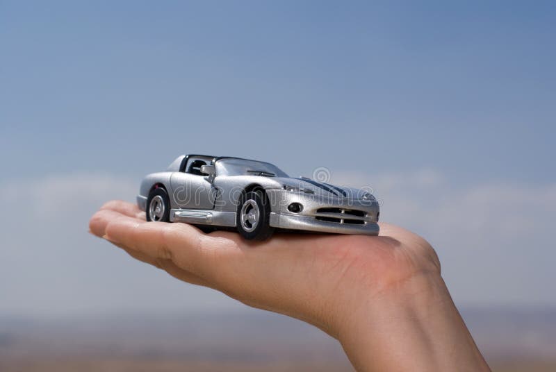 Hand Holding Car stock photo. Image of reaching, carrying - 7653368
