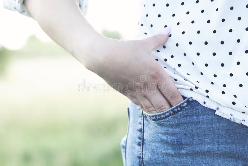 Women in Jeans Standing in the Park, Hand in Pocket Stock Photo - Image ...