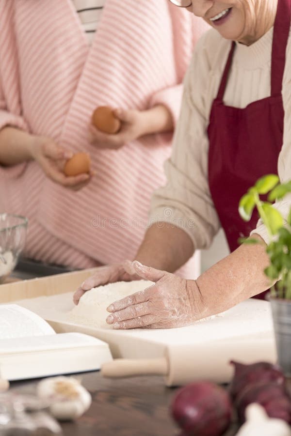 Women in a kitchen stock image. Image of apron, inside - 90876077