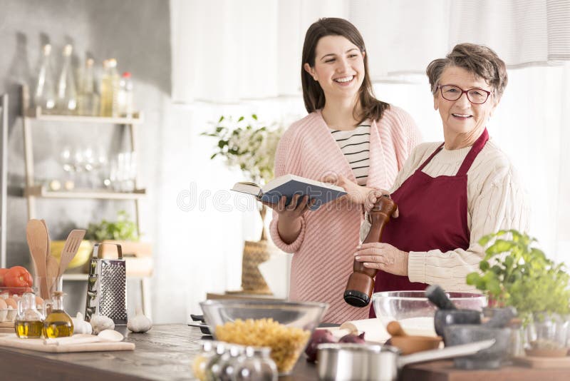 Women in kitchen stock photo. Image of help, cooked, attachment - 90876052