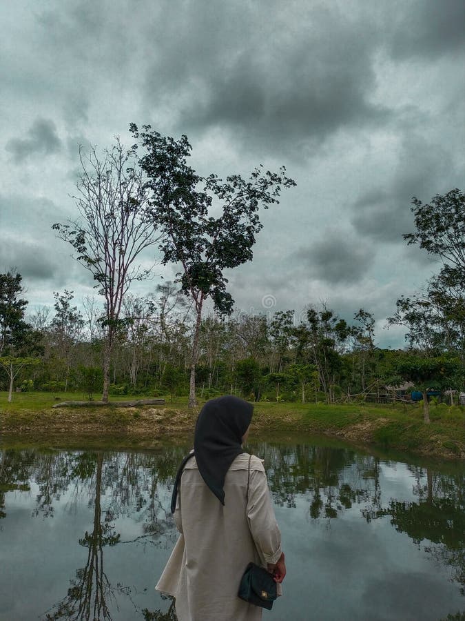 Women by the Lake Which is Very Clean and Beautiful Stock Image - Image ...