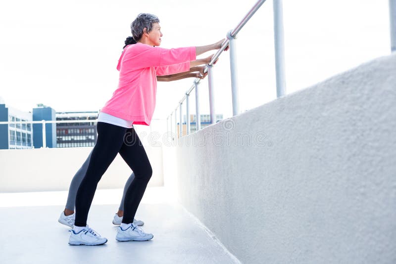 Women Leaning Railing Exercising Stock Photos - Free & Royalty-Free ...