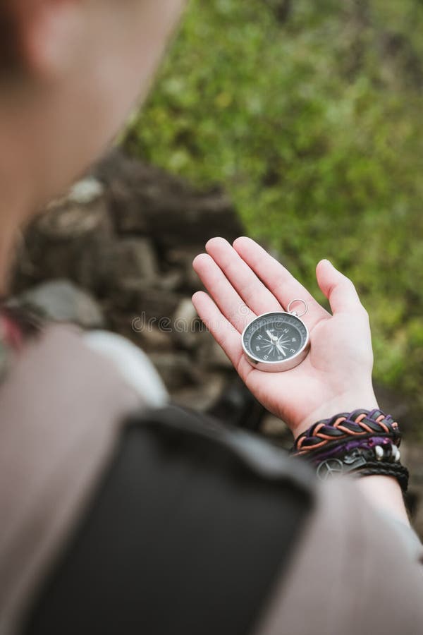 Women Looked at the Compass in Her Hand To Find Right Direction Stock ...