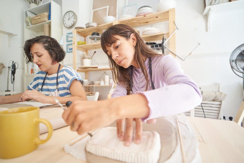 Women Making Handmade Pottery in a Pottery Class. Stock Photo - Image ...