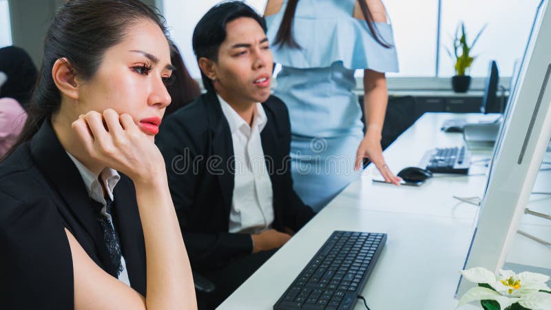 Women and Man Worker Thinking and Look at Computer in Office Stock ...
