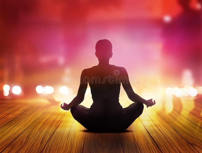 Women are Meditating at Night and Rays of Light in the City Stock Photo ...