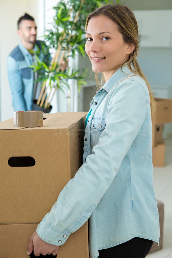Women Moving into New House Stock Image - Image of unfurnished, future ...