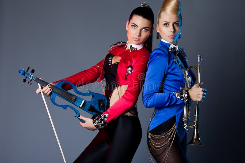 Women with Musical Instruments Stock Image - Image of cute, model: 51439203