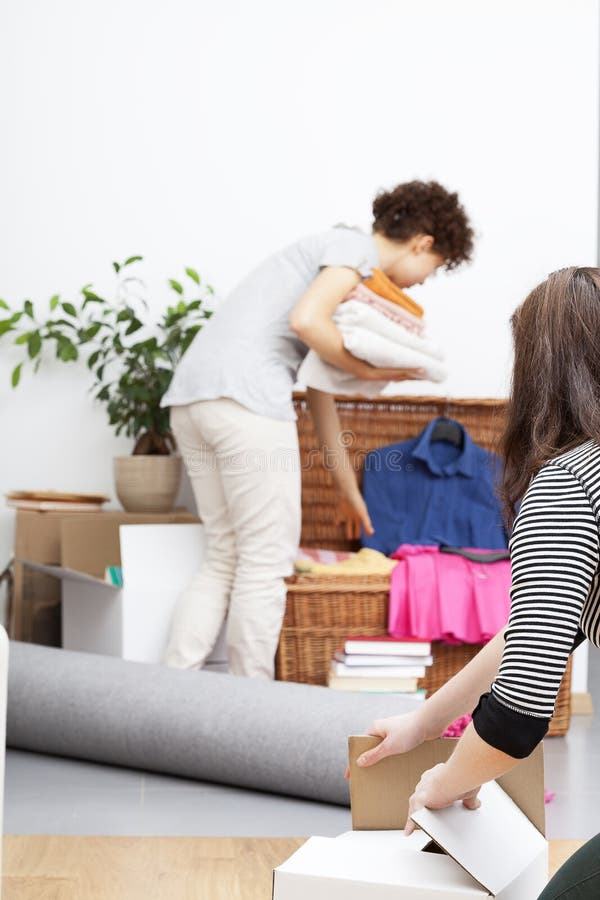 Women Packing House Equipment Stock Photo - Image of adult, living ...