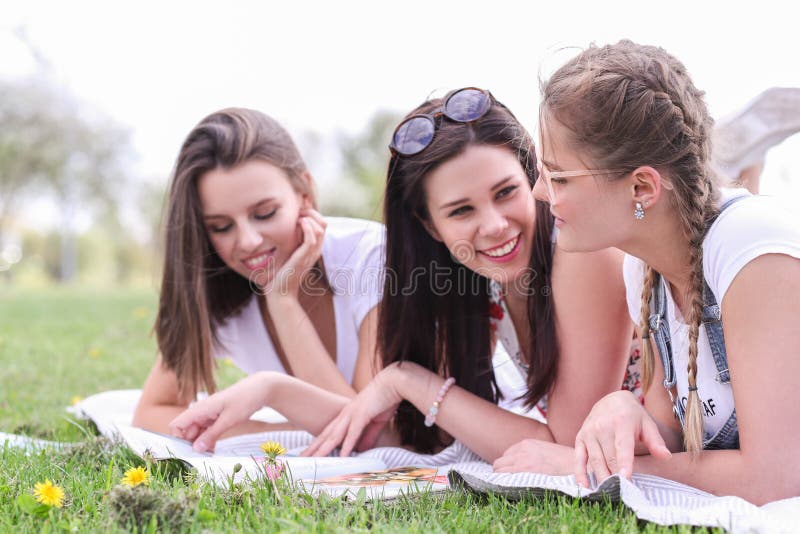 Women in park stock photo. Image of group, grass, date - 95448040