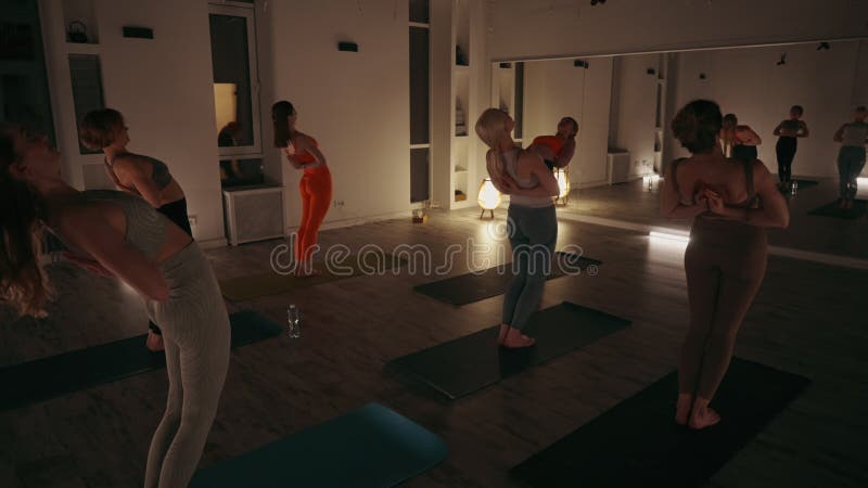 Women Performing Backbend Pose in Yoga Class Stock Footage - Video of ...