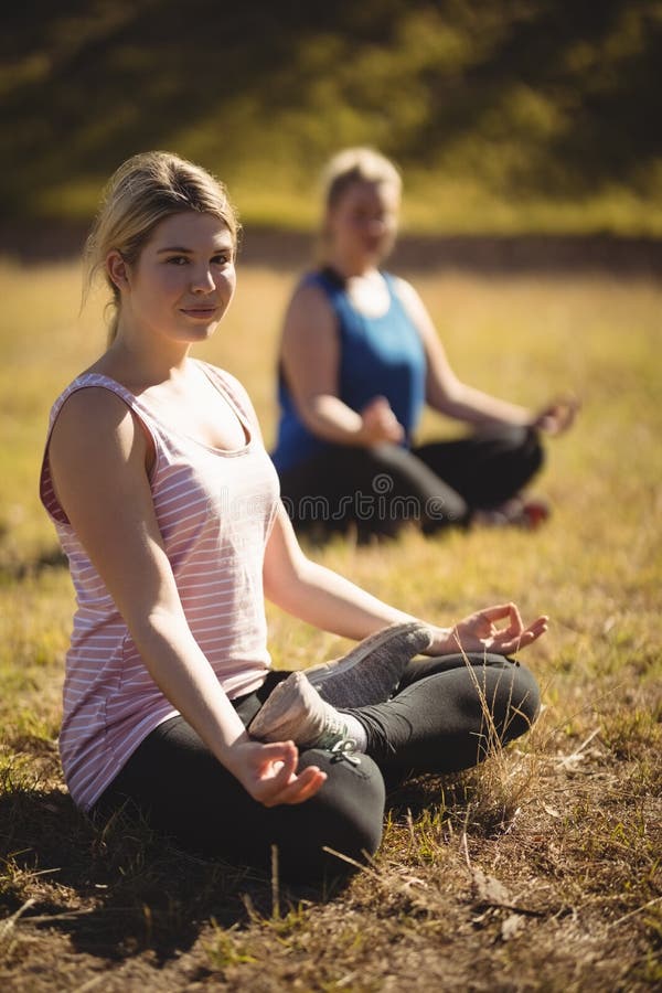 Women Practicing Yoga during Obstacle Course Stock Image - Image of ...