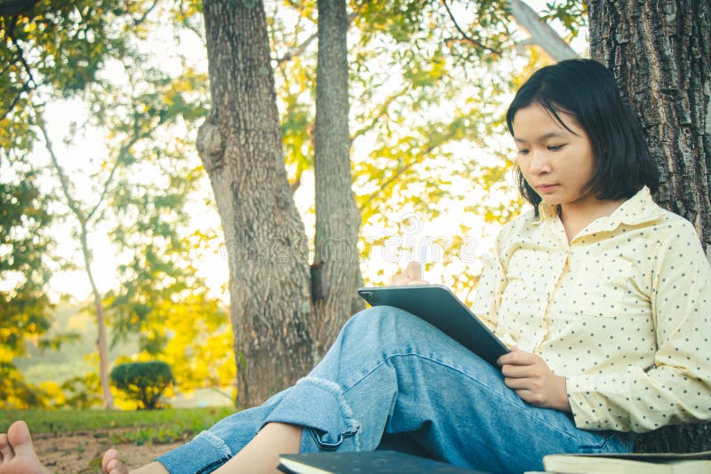 Women Read Book in the Holiday in Quiet Nature, Concept Reading a Book ...