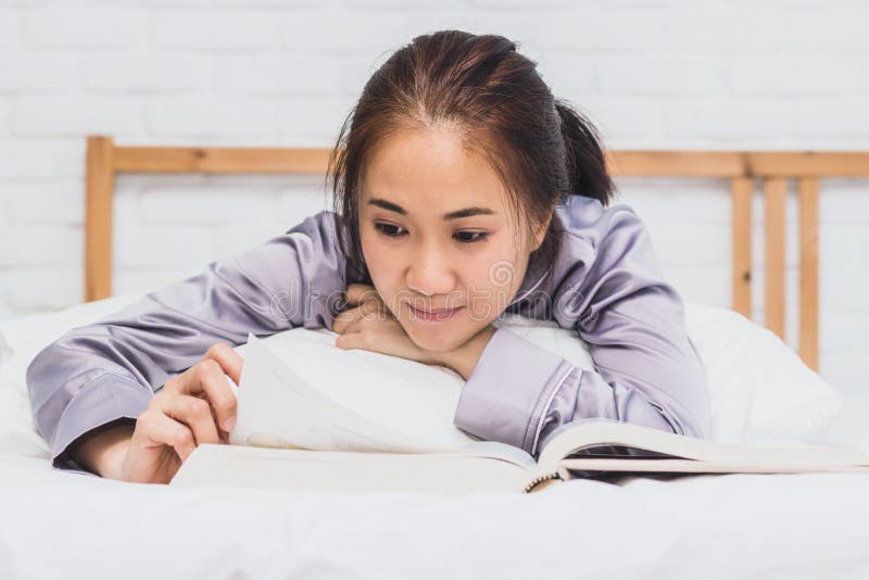 Women Read Book To Learning on Bed in Bed Room Stock Image - Image of ...