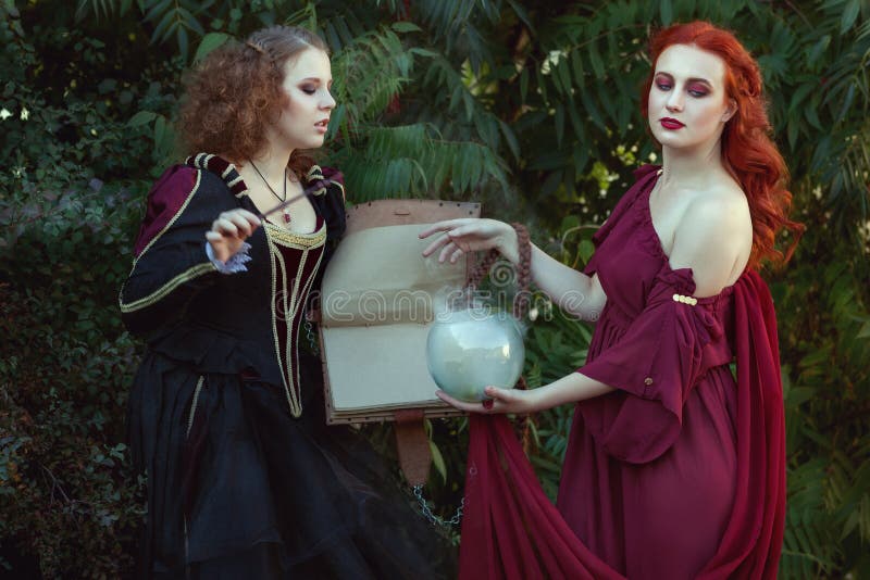 Women Read a Magic Book and Utter Spells. Stock Photo - Image of nature ...