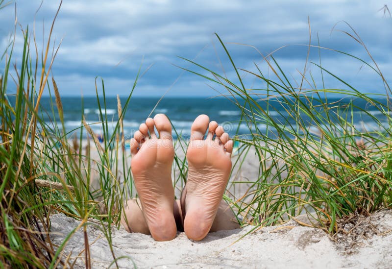Women Relaxing in the Sand Dunes at the Ocean. Stock Photo - Image of ...