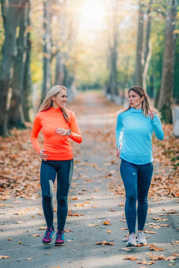 Women Running in Public Park in the Fall Stock Photo - Image of ...