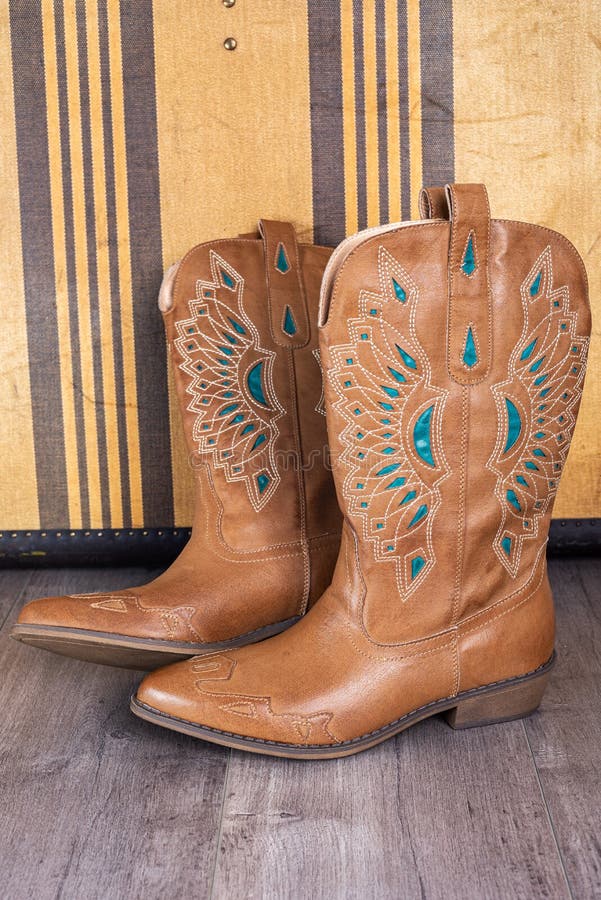 Women`s Cowboy Boots with a Pattern and an Old Suitcase Close-up Stock ...