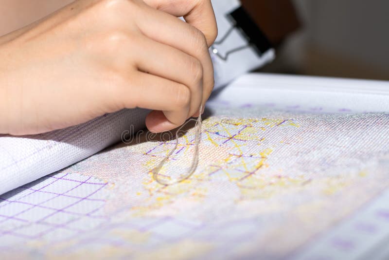 Women`s Hand Doing Cross-stitching with Needle Stock Photo - Image of ...
