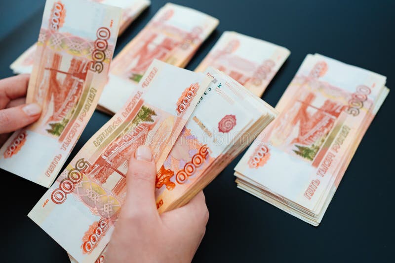 Women S Hands Count a Stack of Money of a Banknotes of 5000 Rubles on a ...
