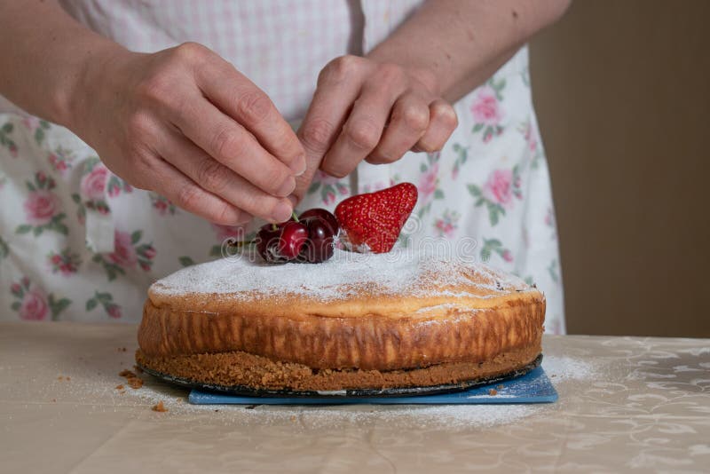 Women& X27;s Hands Decorate the Cake with Berries at Studio Stock Photo ...