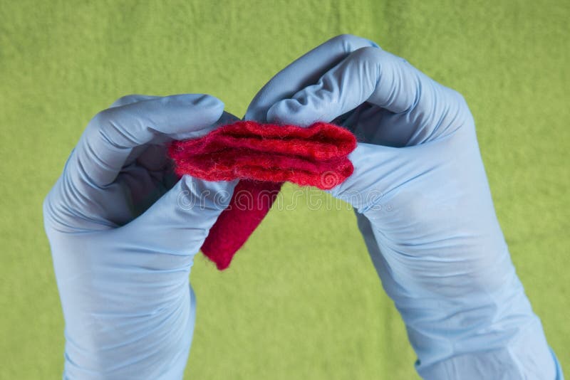 Women`s Hands with Gloves Lay Out the Wool in the Process of Creating a ...