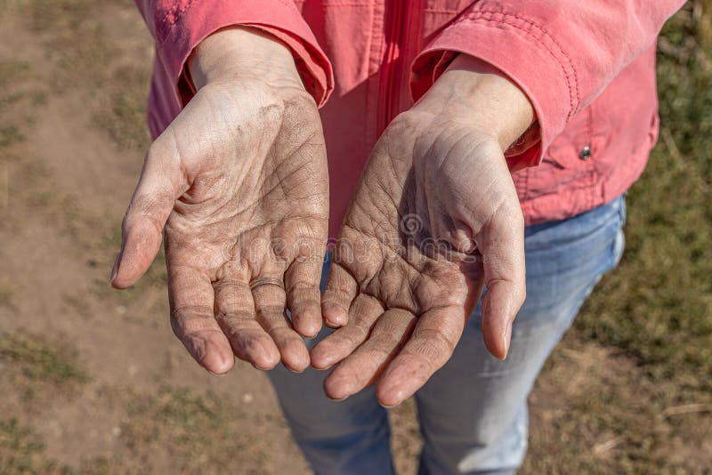 Women`s Hands are Stained with the Dust of the Earth. Close Up Stock ...