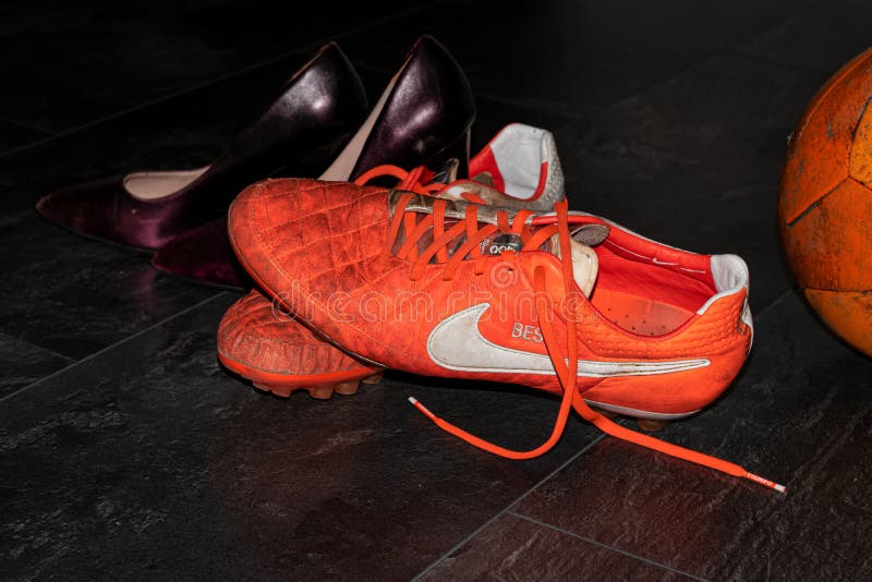 Women S High Heels And Soccer Cleats And A Ball Stock Image Image Of