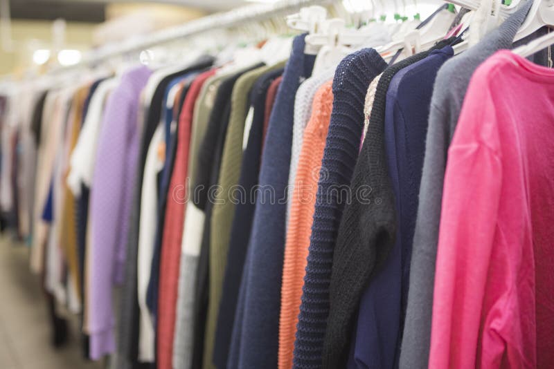 Women`s sweaters stock image. Image of hanger, isolated - 99442245