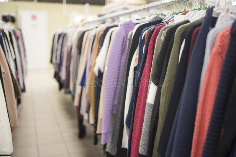 Women`s Sweaters in the Store Stock Image - Image of coat, graphic ...