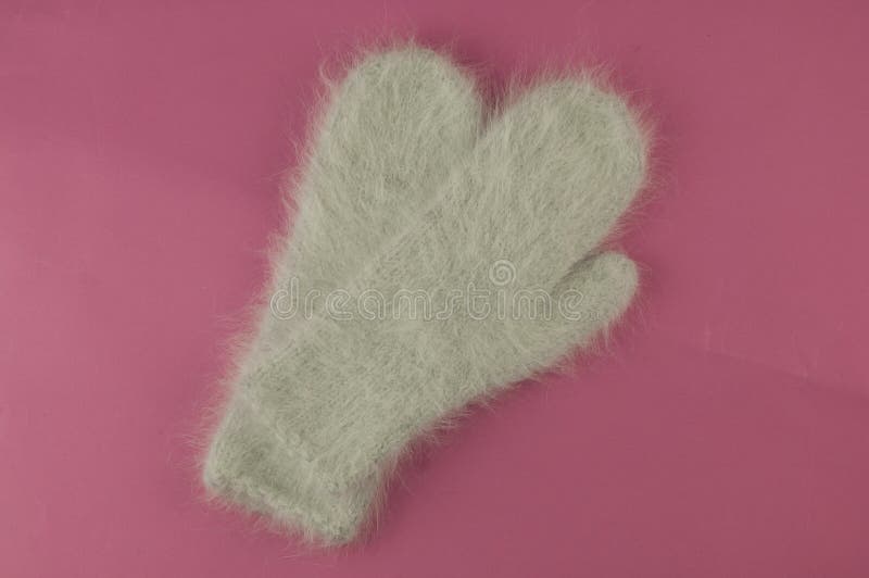 Women`s Winter Down Mittens on Pink Background Stock Image - Image of ...