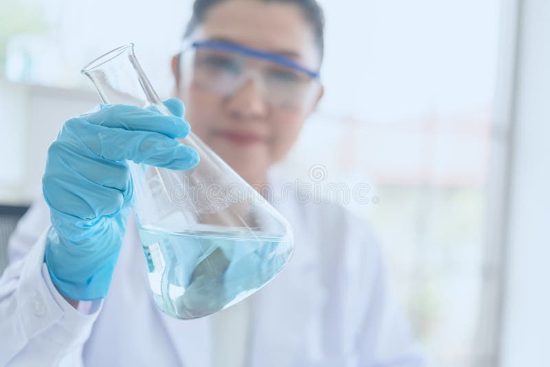 Women Scientist Doing Test in Laboratory. Women Scientist Doing Some ...