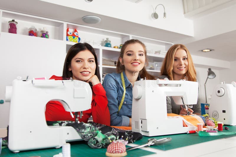 Women in a sewing workshop stock image. Image of fashion - 63783373