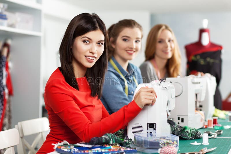 Women in a sewing workshop stock photo. Image of fashion - 63783374
